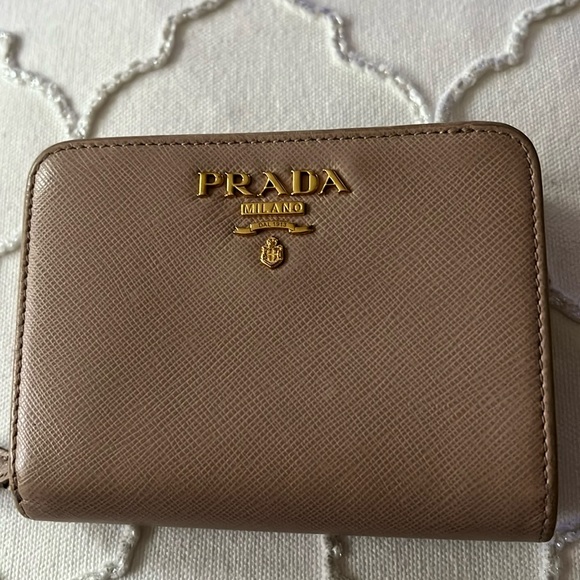 Prada | Bags | Authentic Compact Prada Wallet In Gold Saffiano Leather ...